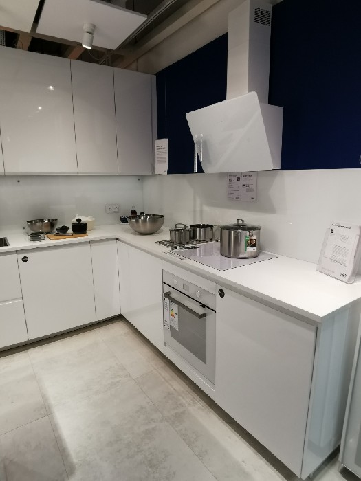 A Modern Marvel: The VOXTORP High-Gloss White Kitchen from IKEA